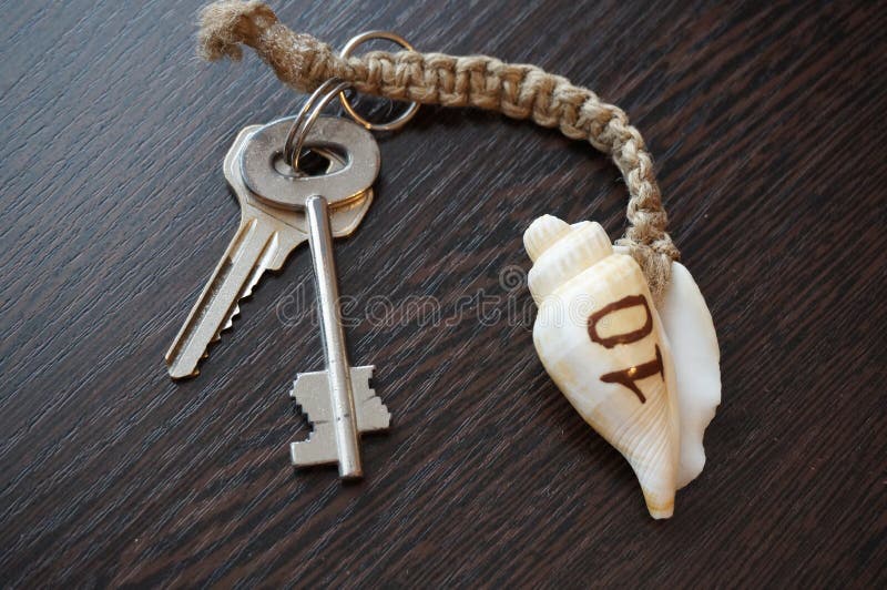 Key with shell stock image. Image of keychain, travelling - 131419847
