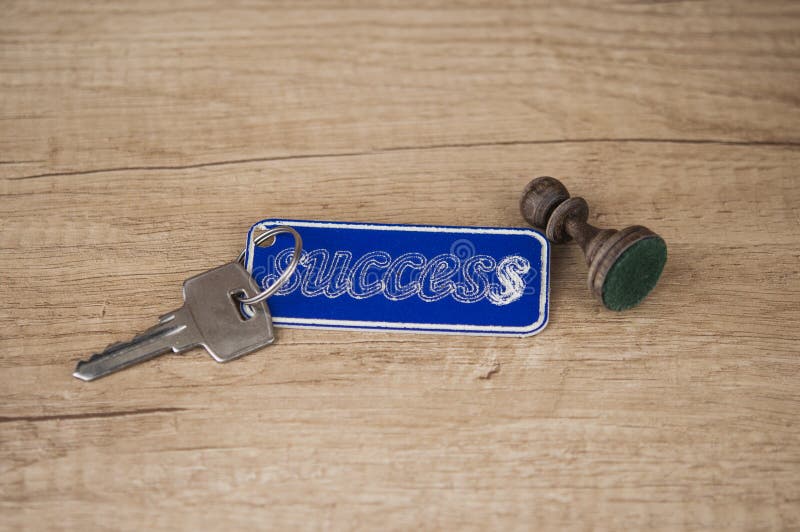 Key with a success tag stock image. Image of marketing - 216065693