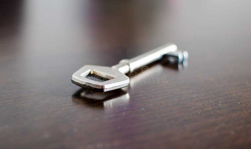 Key on a table stock photo. Image of open, door, unlock - 47736024