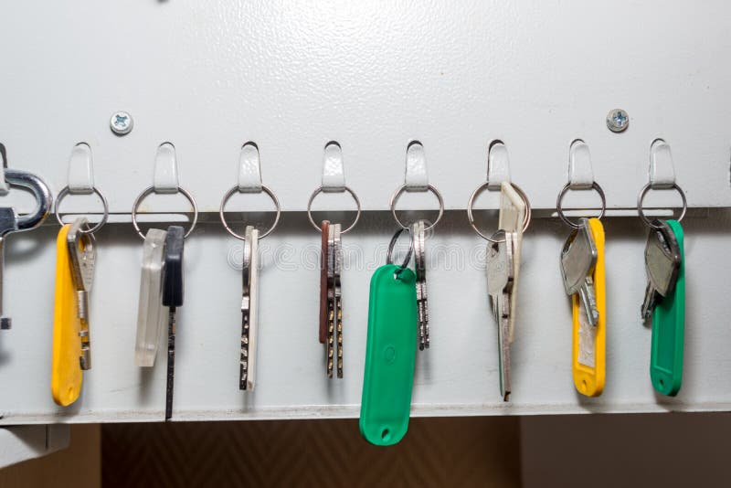 Key Tags Hanging in the Closet Stock Image - Image of cabinet, desk ...