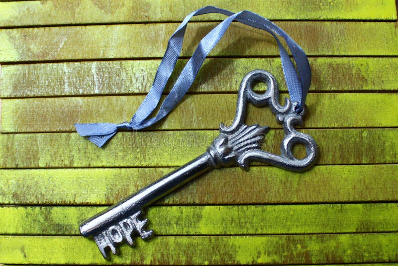 A key with the text hope stock photo. Image of symbol - 134410264