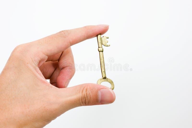 Key in hand unlock success stock photo. Image of gate, bottom - 581880