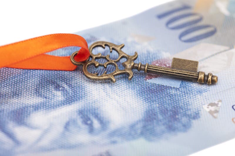 Key To Success with Red Bow on Swiss Franc Note Stock Photo - Image of ...