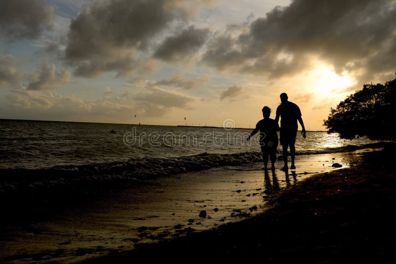 Key west walk on the beach stock photo. Image of dawn - 243000666