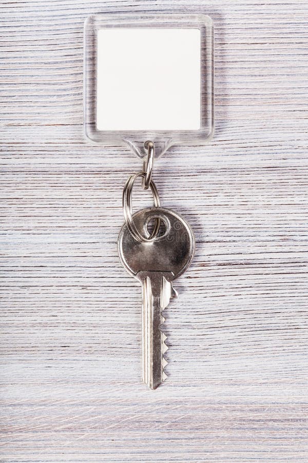 Key with White Blank Keychain on Wood Board Stock Photo - Image of tool ...