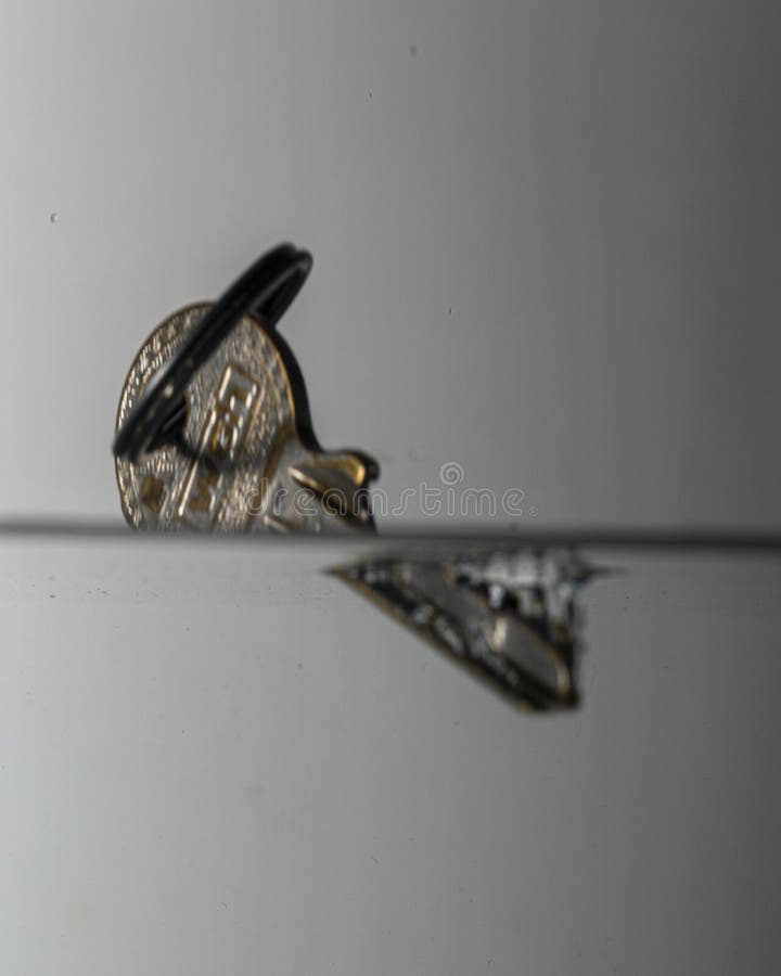 Key Wirgh Key Ring Drop with Splash in Water Stock Image - Image of ...