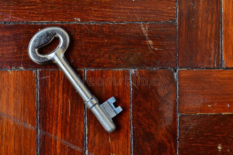 Key on wooden floor stock photo. Image of floor, tiled - 18249694