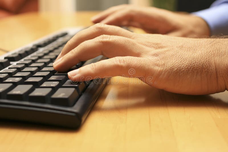 Hand Fist on Computer Keyboard Stock Photo - Image of occupation ...