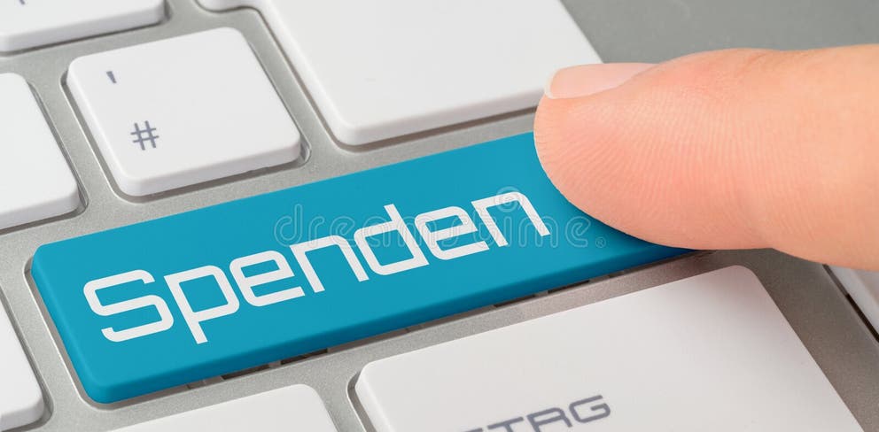 A Keyboard with a Blue Labeled Button - Donations in German Stock Photo ...