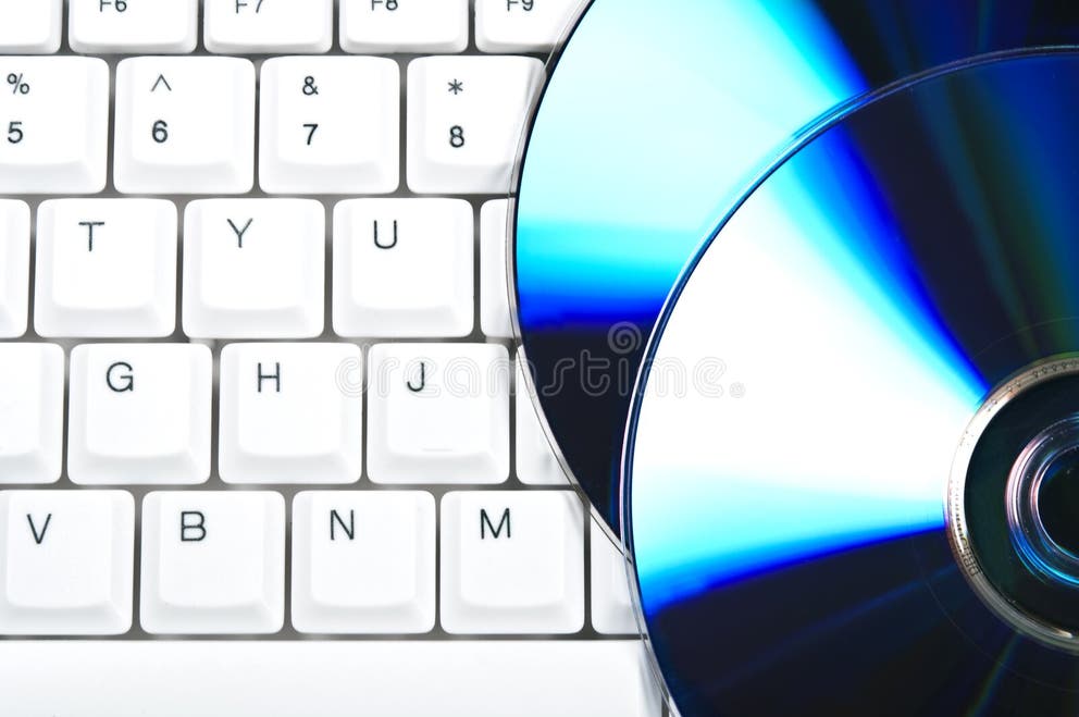 Keyboard and cd-roms stock image. Image of writable, disc - 20532261