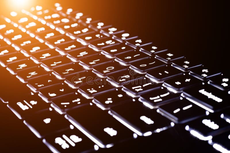 Keyboard Close-up with Backlight on a Black Background. Fragment with ...