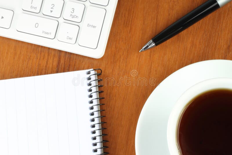 Red Cup of Hot Coffee, Notepad and Pencil on the Desktop in the Office ...