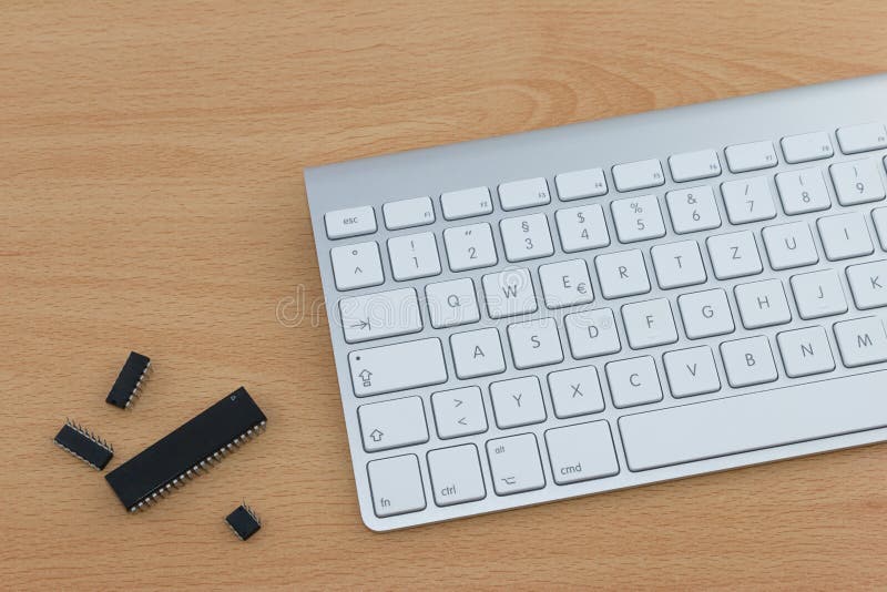 Keyboard and Computer Parts on Desk Stock Photo - Image of processor ...