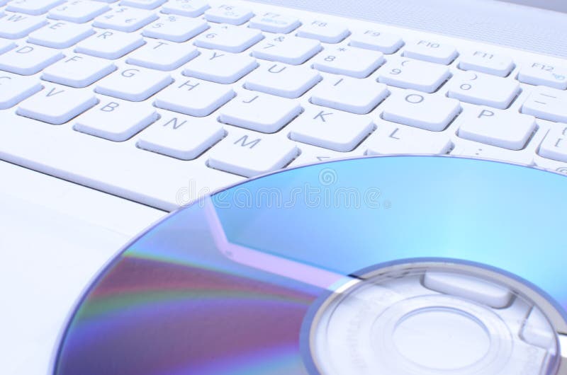 Keyboard with disk stock image. Image of disc, data, technology - 22554403