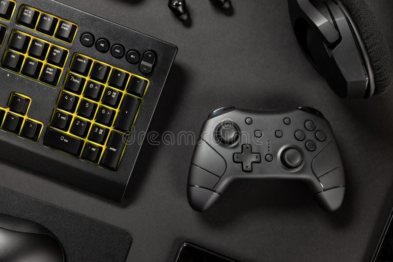 Keyboard and Game Controller Amidst Various Wireless Devices Stock ...