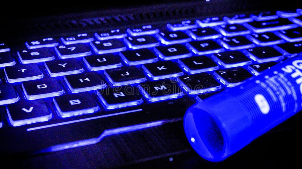 Keyboard and the glue editorial stock image. Image of backlight - 225869454