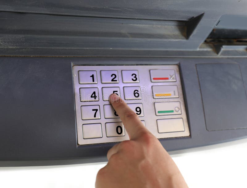 Hand Typing the Secret Code in the Keyboard of an ATM Stock Photo ...