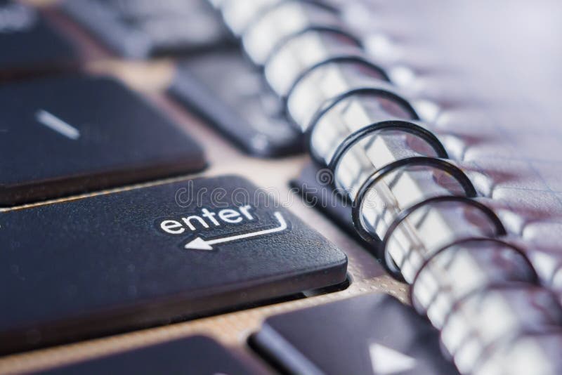 Keyboard Laptop with a Key To Enter, on the Right is a Notepad_ Stock ...