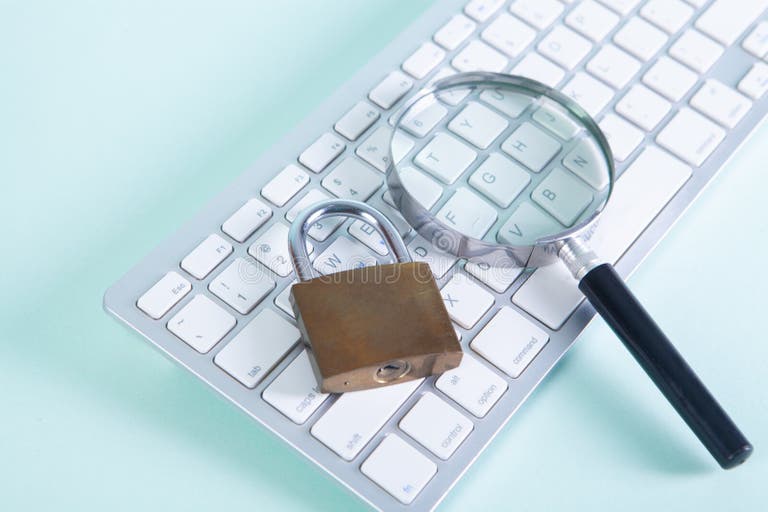On the Keyboard a Magnifier and a Lock Stock Photo - Image of internet ...