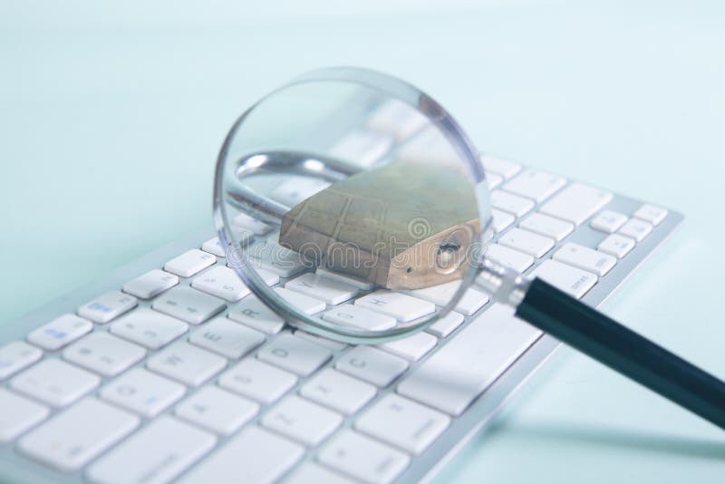On the Keyboard a Magnifier and a Lock Stock Image - Image of ...