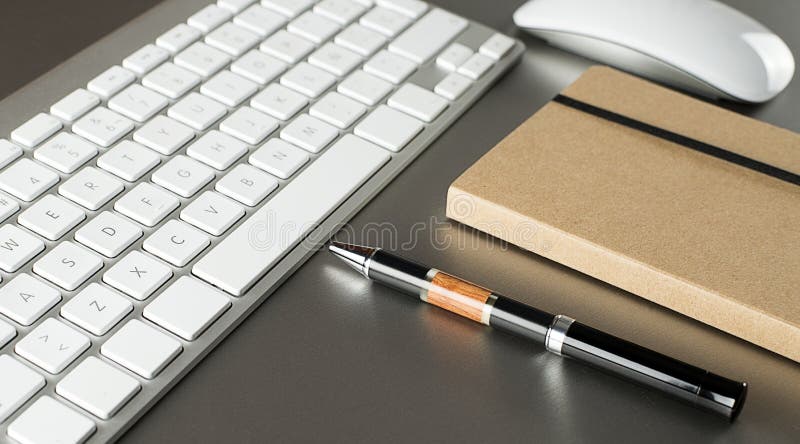 Keyboard, Mouse, and Pen with a Notebook Stock Photo - Image of ...
