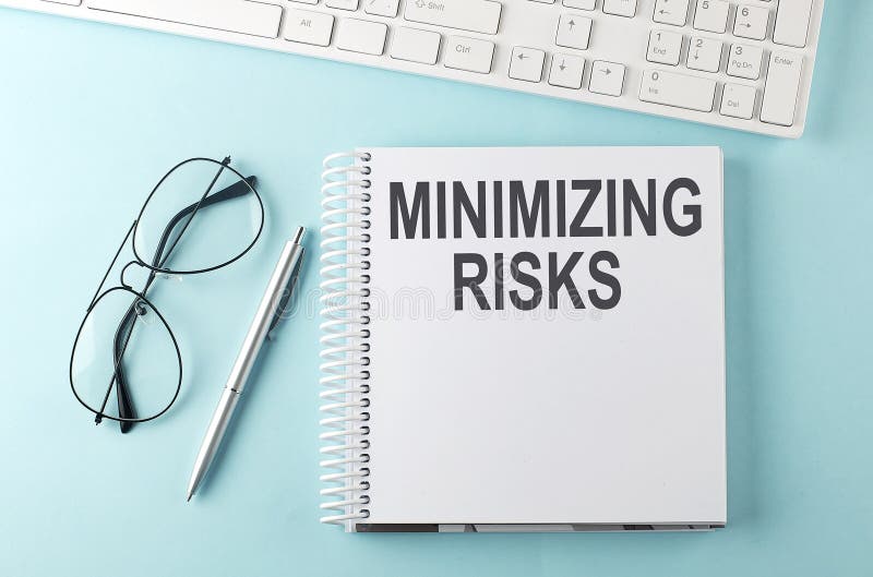 MINIMIZING RISKS Text on Sticky on Chart Stock Image - Image of ...