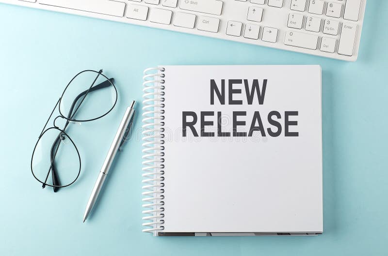 Keyboard, Notebook,pen and Glasses on the Blue Background with Text NEW ...