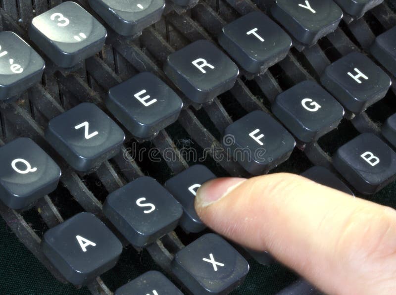 Keyboard of the Old Typewriter with a Finger Stock Photo - Image of ...
