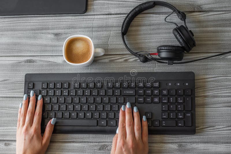 Keyboard Over a Table beside a Ceramic Cup Filled with Hot Brew ...