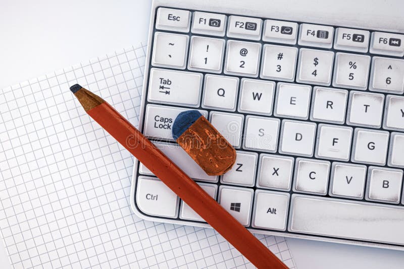 Keyboard with Pen and Eraser on Work Paper Stock Image - Image of ...