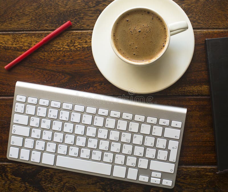 Keyboard, Pencil and a Cup of Coffee on a Dark Wooden Table. Stock ...