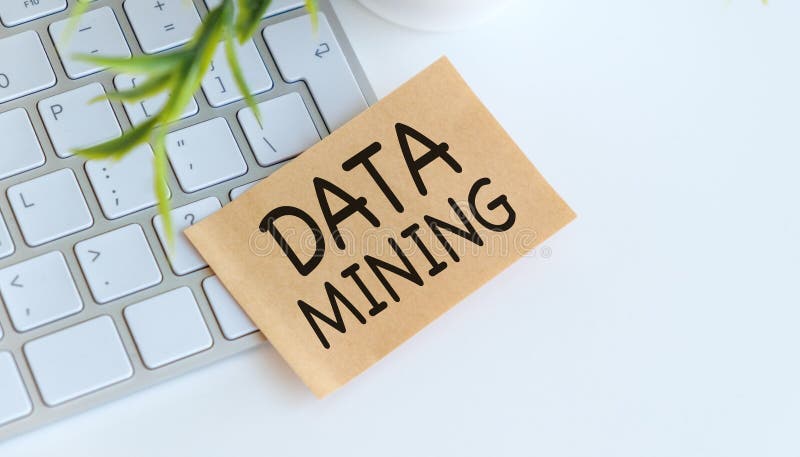 A Keyboard with a Piece of Paper that Says Data Mining on it Stock ...