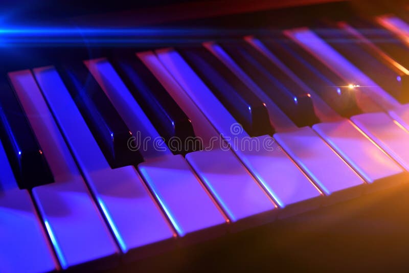 Keyboard Synthesizer with Colorful Lights in Concert Stock Image ...