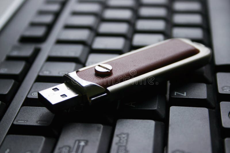 Keyboard and USB stick stock photo. Image of information - 13402170