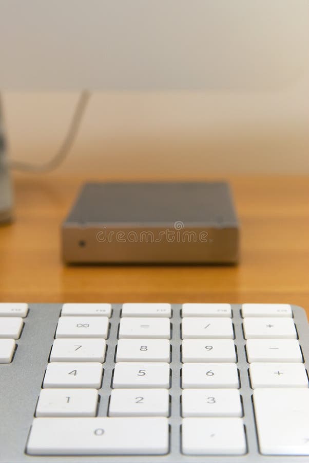 Keyboard with White Keys and Hard Drive Stock Photo - Image of work ...