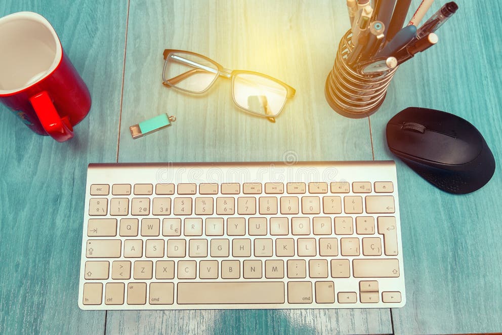Keyboard and Work Tools on Wooden Desktop at Home. Teleworking Stock ...