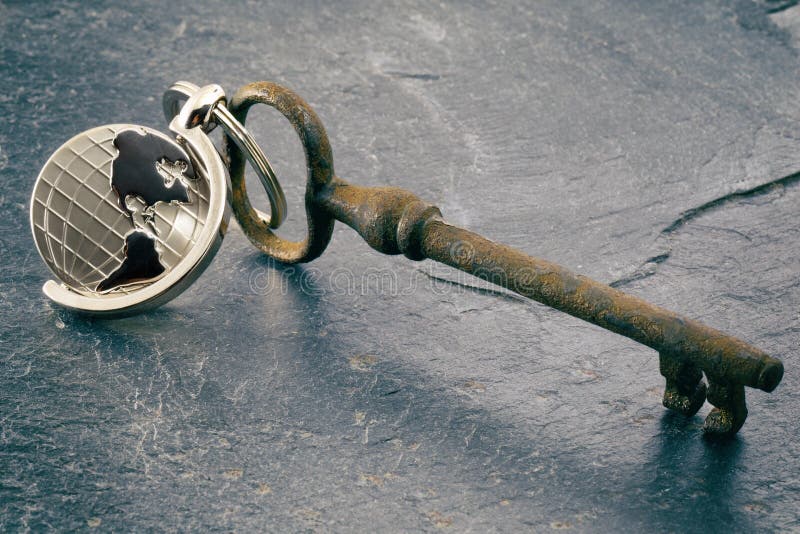 Keychain Figure of World and Old Key Secrets Stock Photo - Image of ...