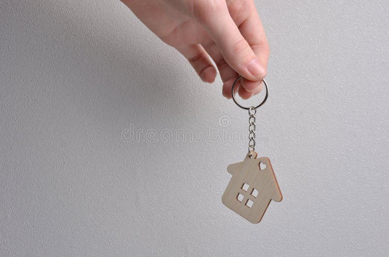 Keychain in the Shape of a House in Hands. Stock Image - Image of ...