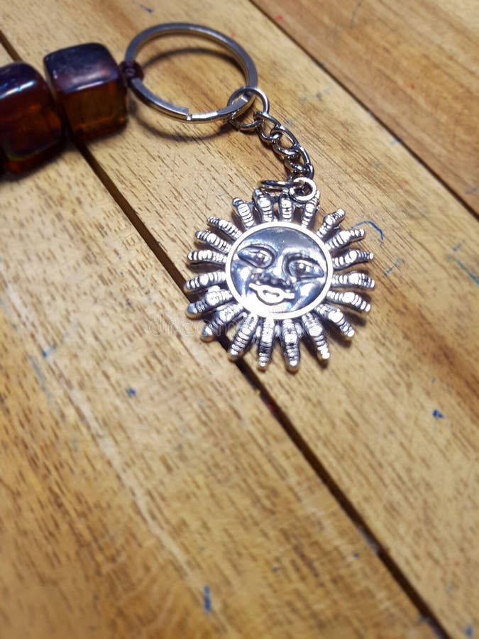 Keychain sun head stock photo. Image of metal, jewellery - 201892648