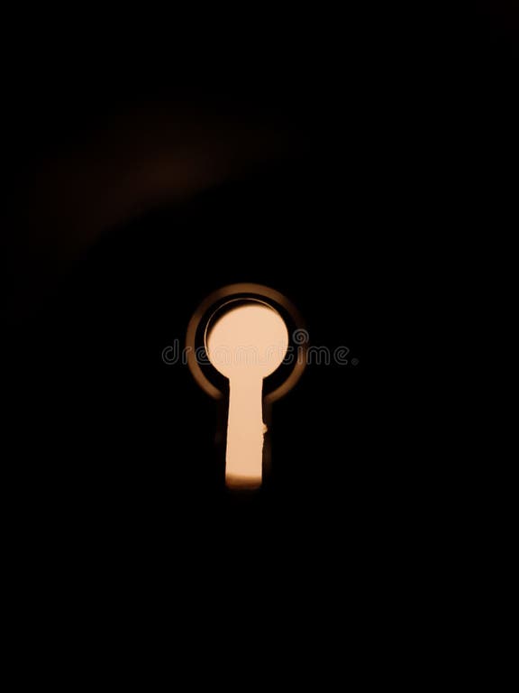 Keyhole on a Black Background, Yellow Low Light Stock Photo - Image of ...