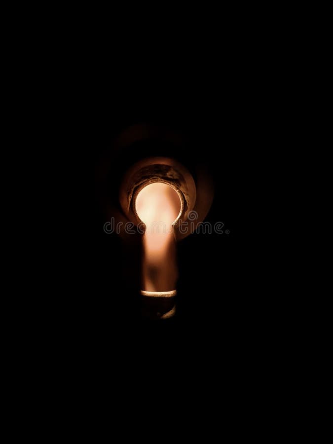 Keyhole on a Dark Background, Yellow Low Light Stock Image - Image of ...