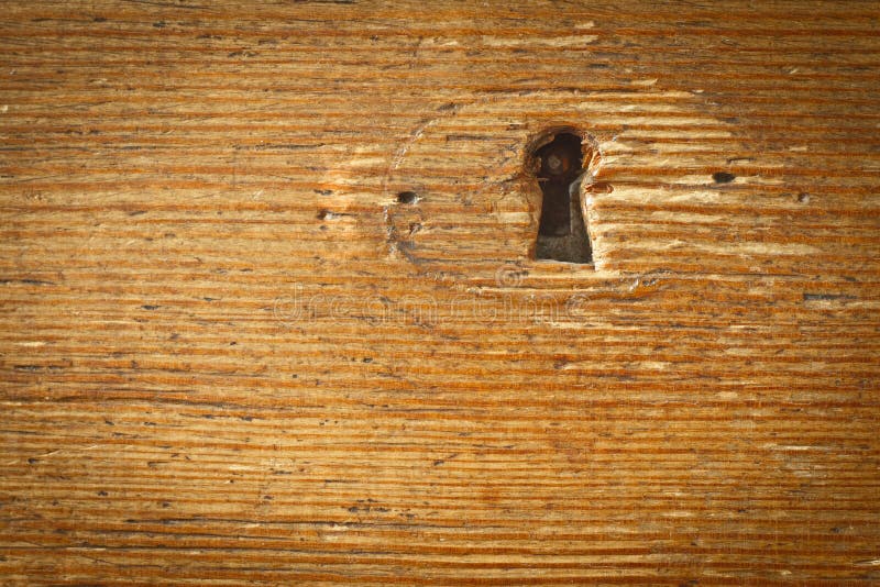 Keyhole in wooden wall stock image. Image of used, wall - 65819283