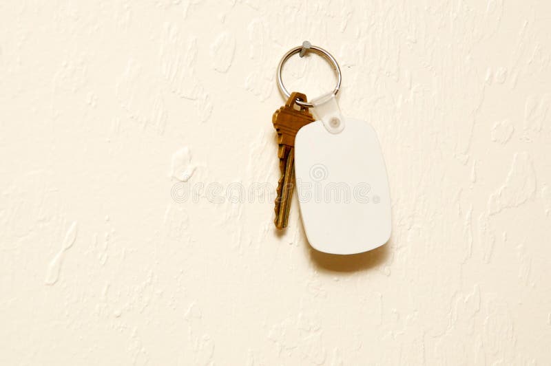 Keyring with Key and White Fob on Wall Stock Image - Image of copy ...