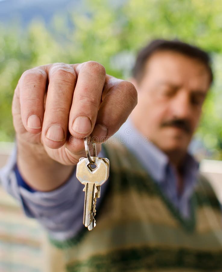 623 Man Hand Holds Keys Stock Photos - Free & Royalty-Free Stock Photos ...