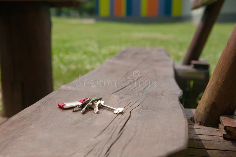 Keys Forgotten on Wooden Bench Outdoors. Lost and Found Stock Image ...