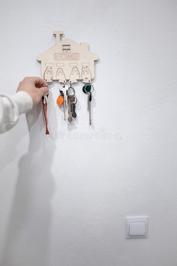 The Keys Hang on the Key Holder on a White Background Stock Photo ...