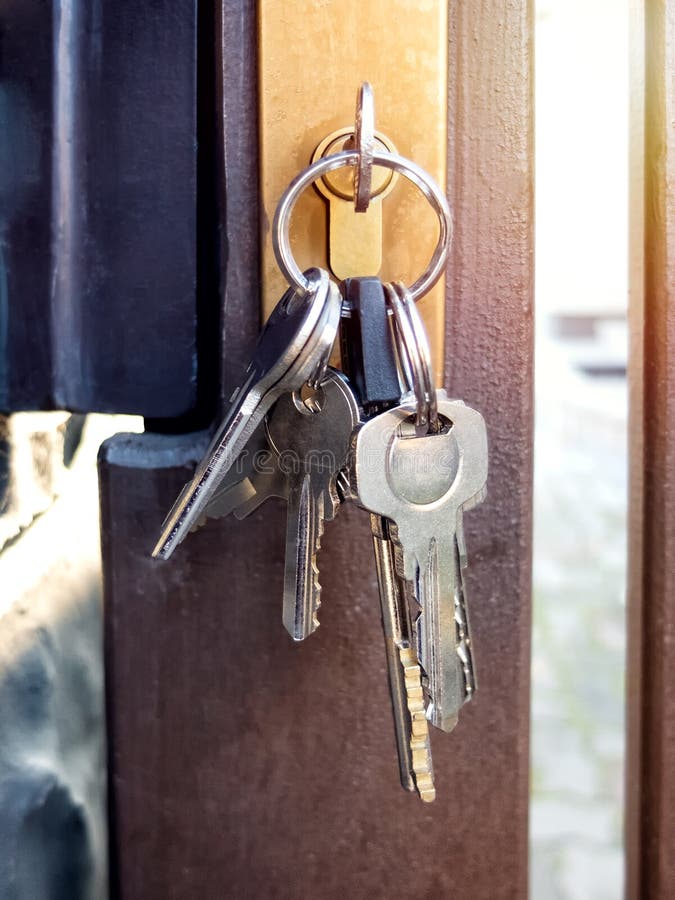 Keys Hanging in the Keyhole of the Gate Stock Image - Image of keyhole ...