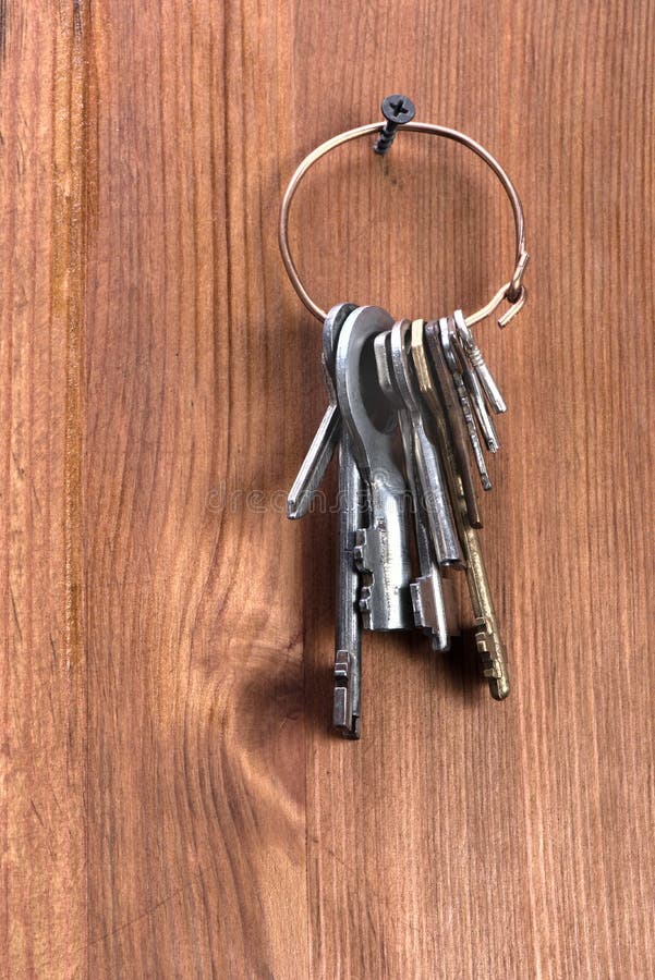 Hanging Keys On The Wooden Wall Stock Photo - Image of keyhole, lock ...