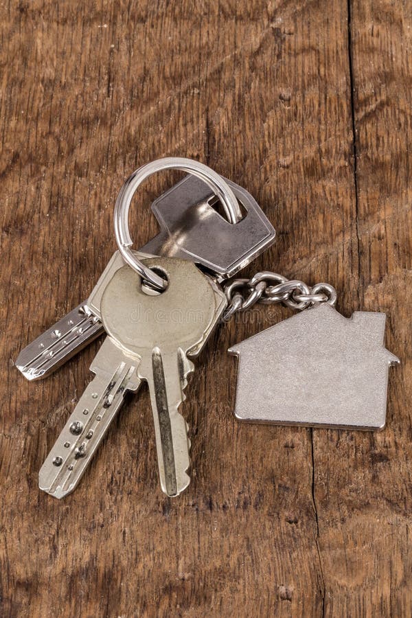Keys for House on Wooden Table Stock Photo - Image of chrome, chain ...
