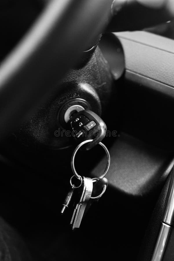 Keys in the ignition stock photo. Image of black, electrical - 97384272